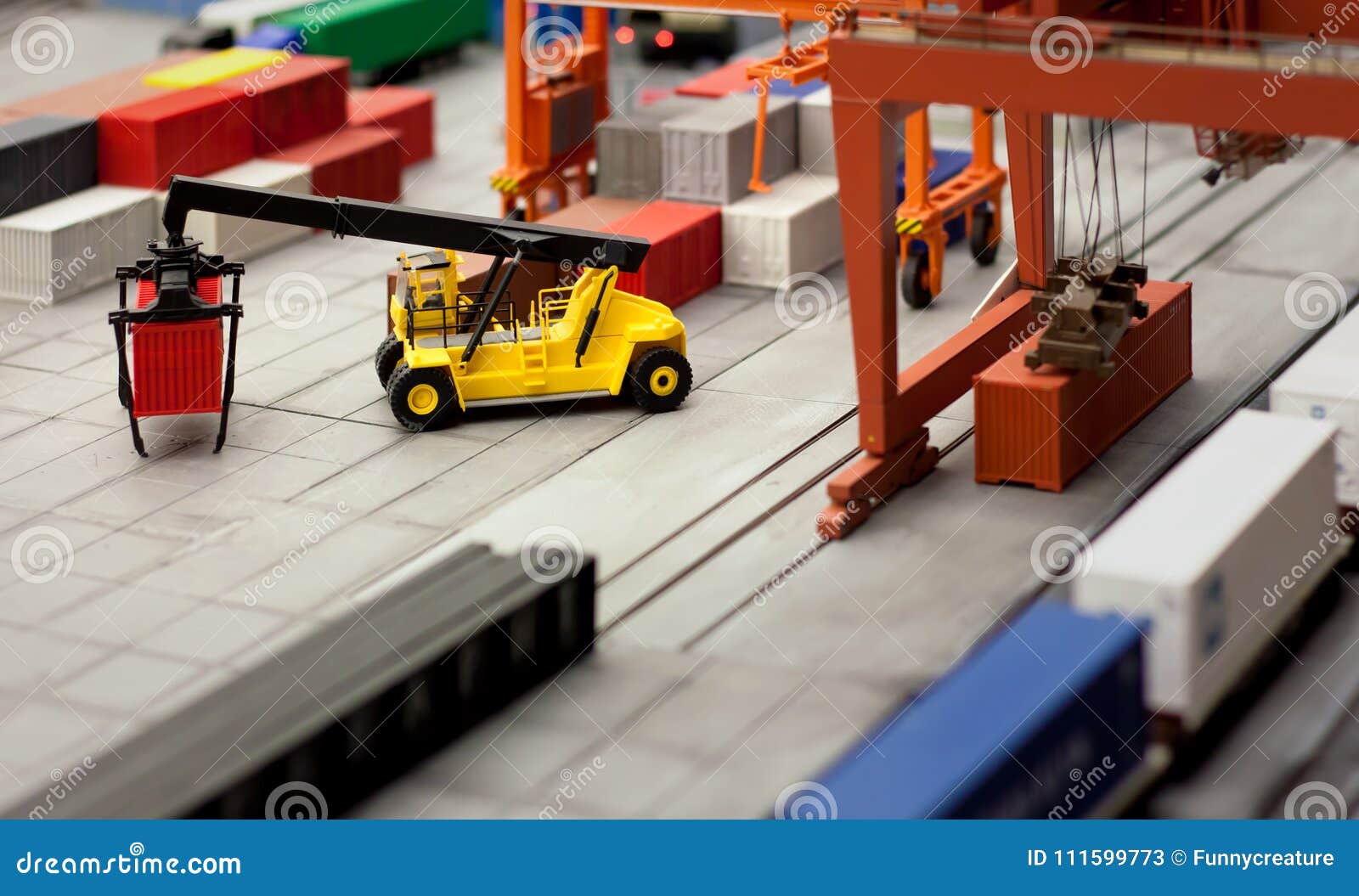 Toy Loader Carrying a Container in a Layout of a Cargo Hub Stock Image ...