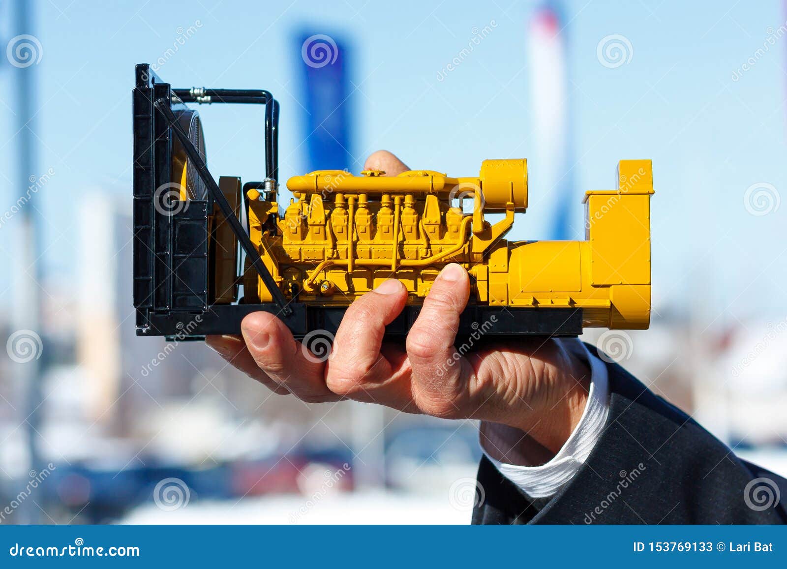 A Toy Model of a Gas Generator Set is in the Male Hand. Stock Image ...