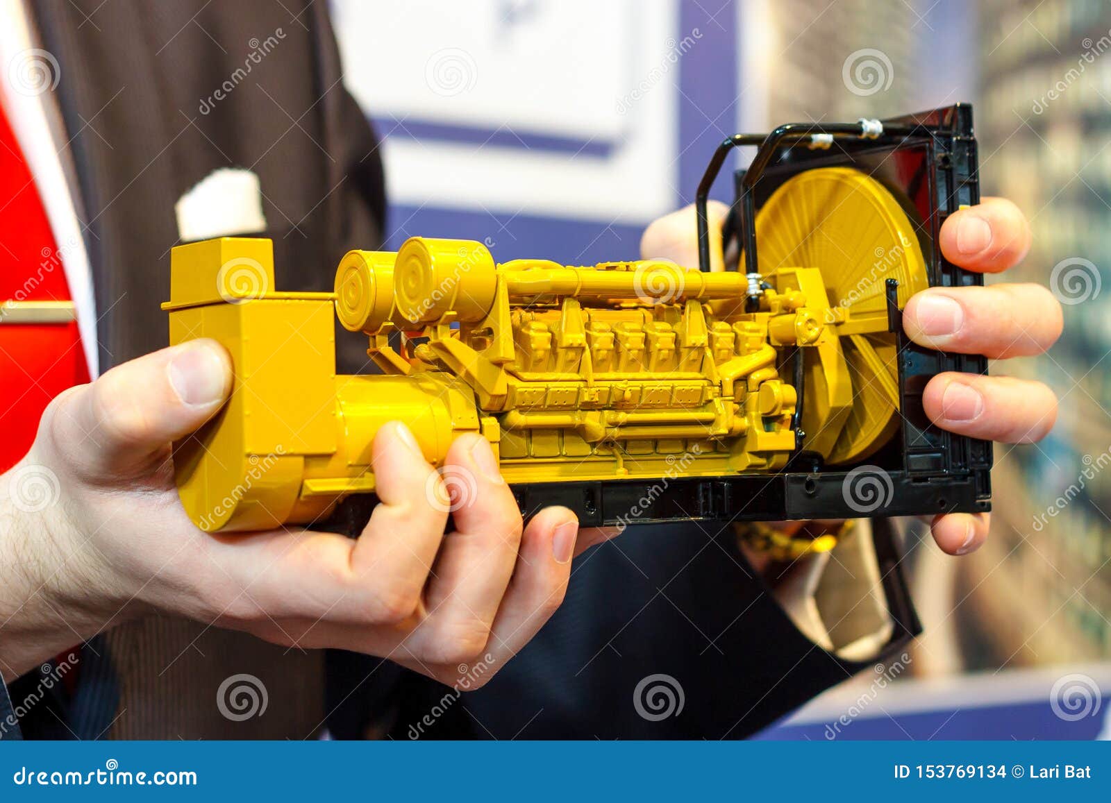 A Toy Model of a Gas Generator Set is in the Male Hand. Stock Photo ...