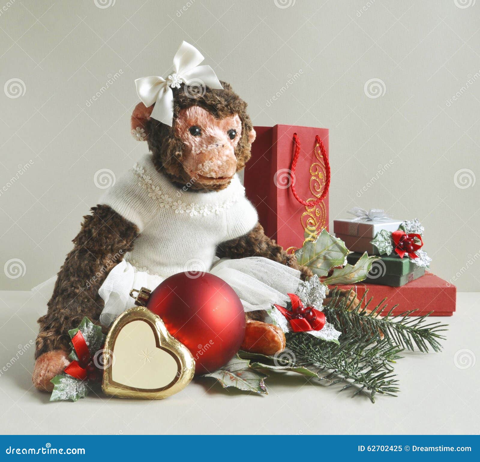 Toy Monkey with Christmas Decorations and Gifts Stock Image - Image of ...