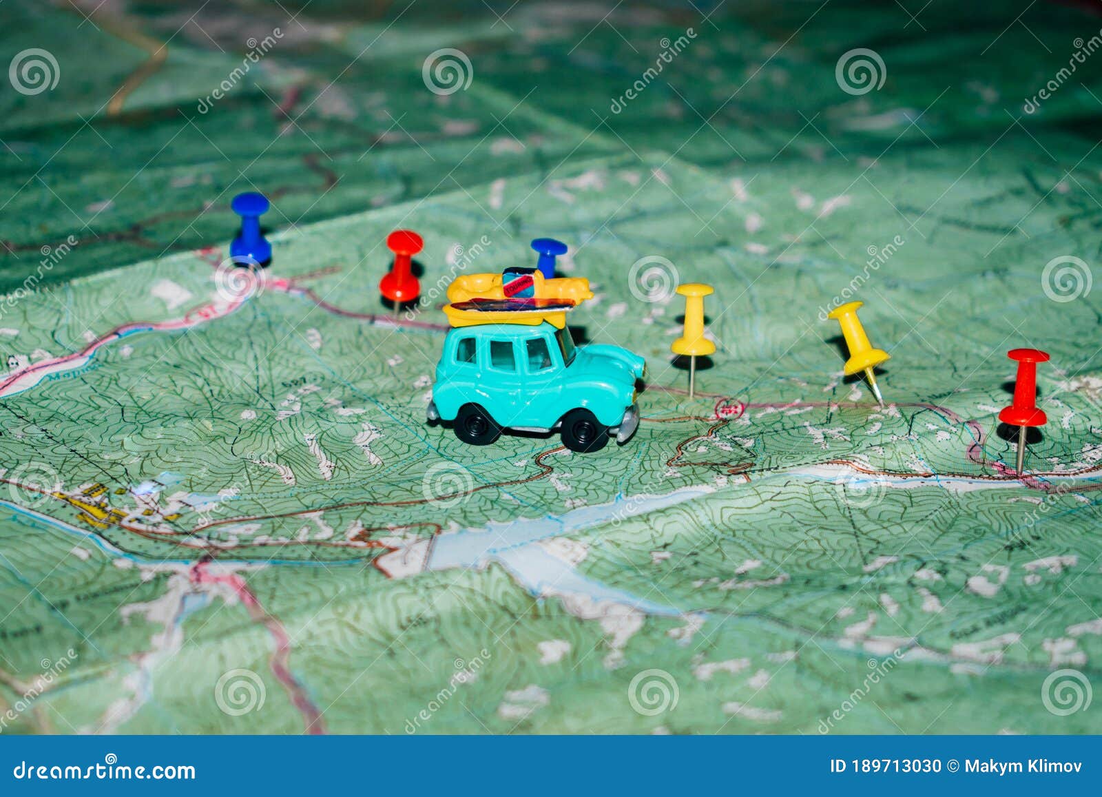 Toy Old Car Rides on a Topographic Map, the Route Indicated by the ...