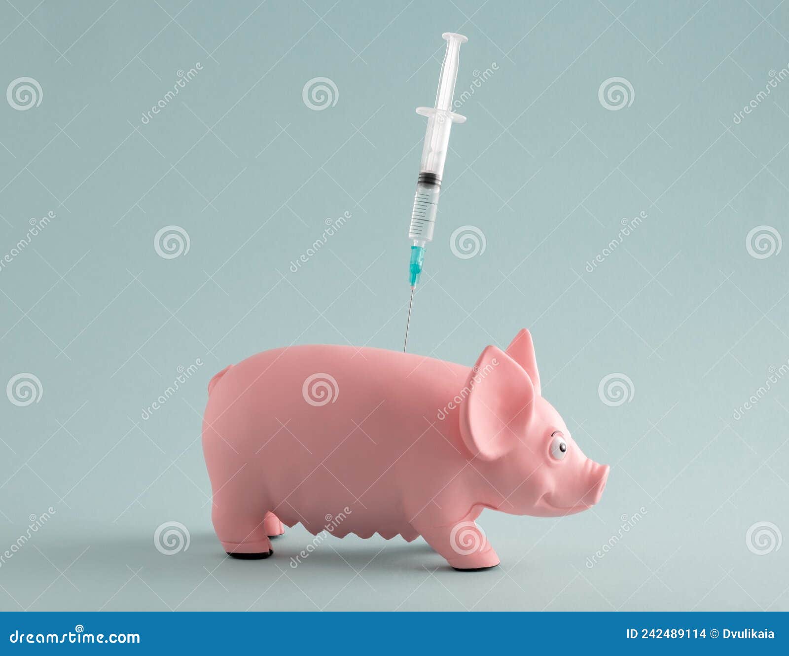 Toy Pig with Syringe on Blue Background. Science, Vaccination Concept ...