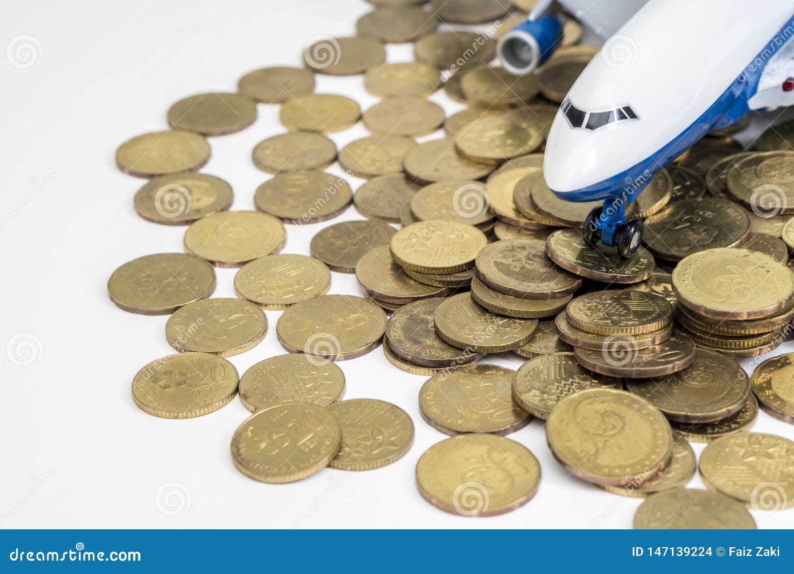 Toy Plane with Coins, Travel Concept Stock Photo - Image of gold ...