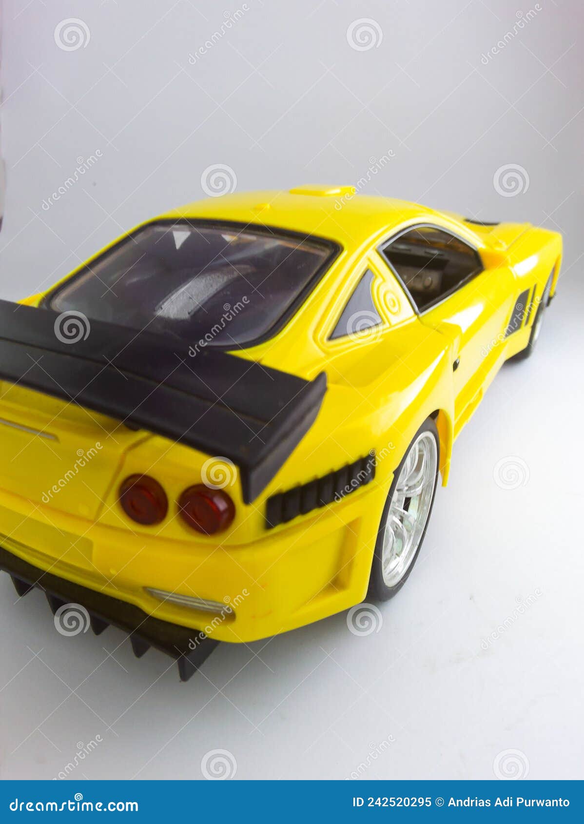 A Toy Racing Car with Yellow Color Stock Image - Image of wheel, racing ...