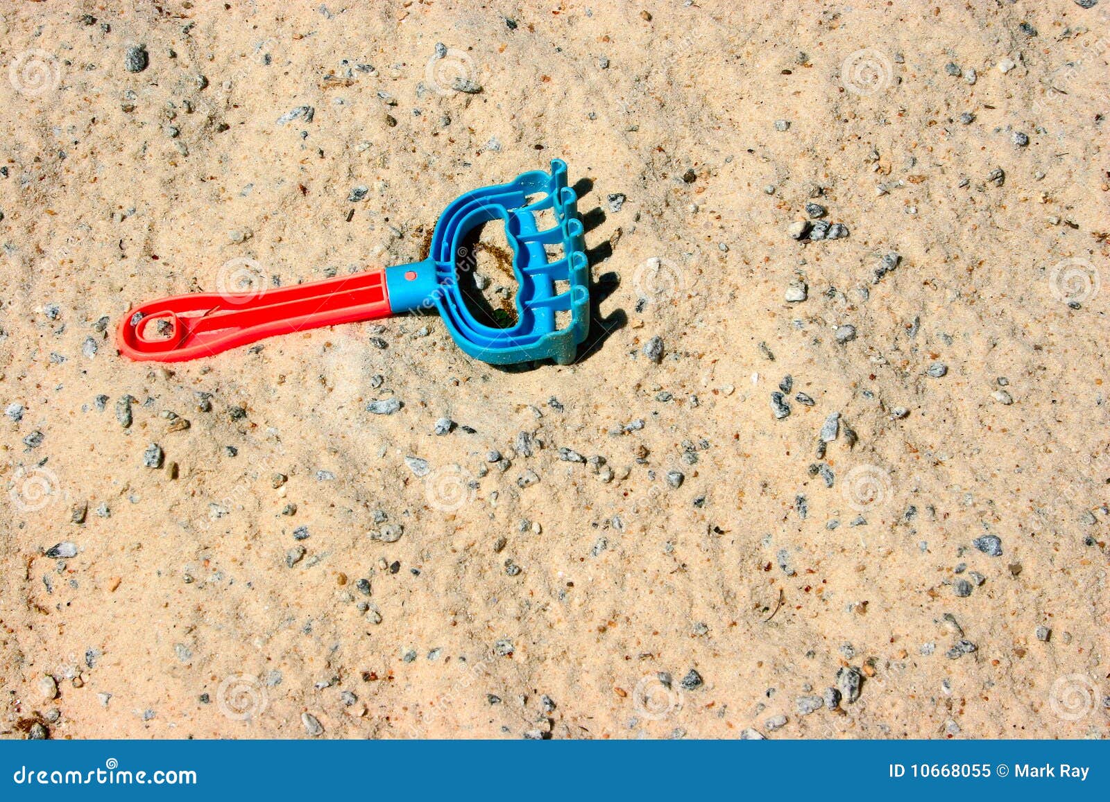 Toy rake and sand stock image. Image of blue, rake, recess - 10668055
