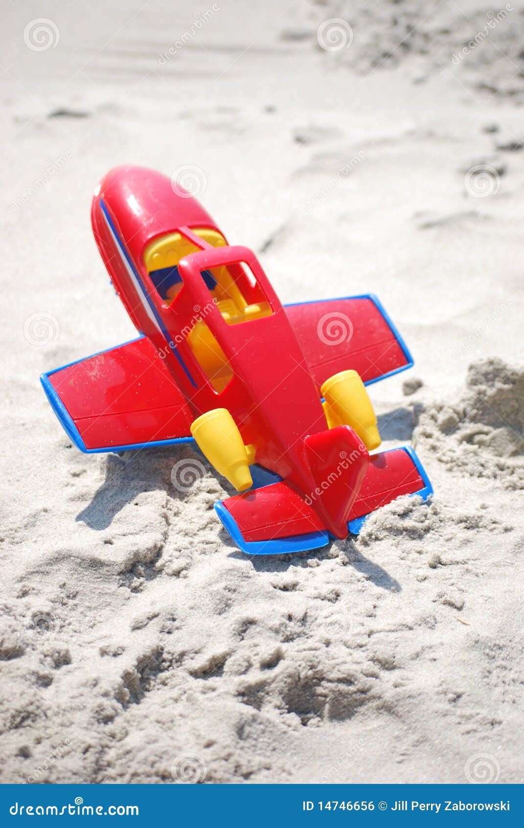 Toy Red Airplane Laying in the Sand Stock Photo - Image of sand, beach ...