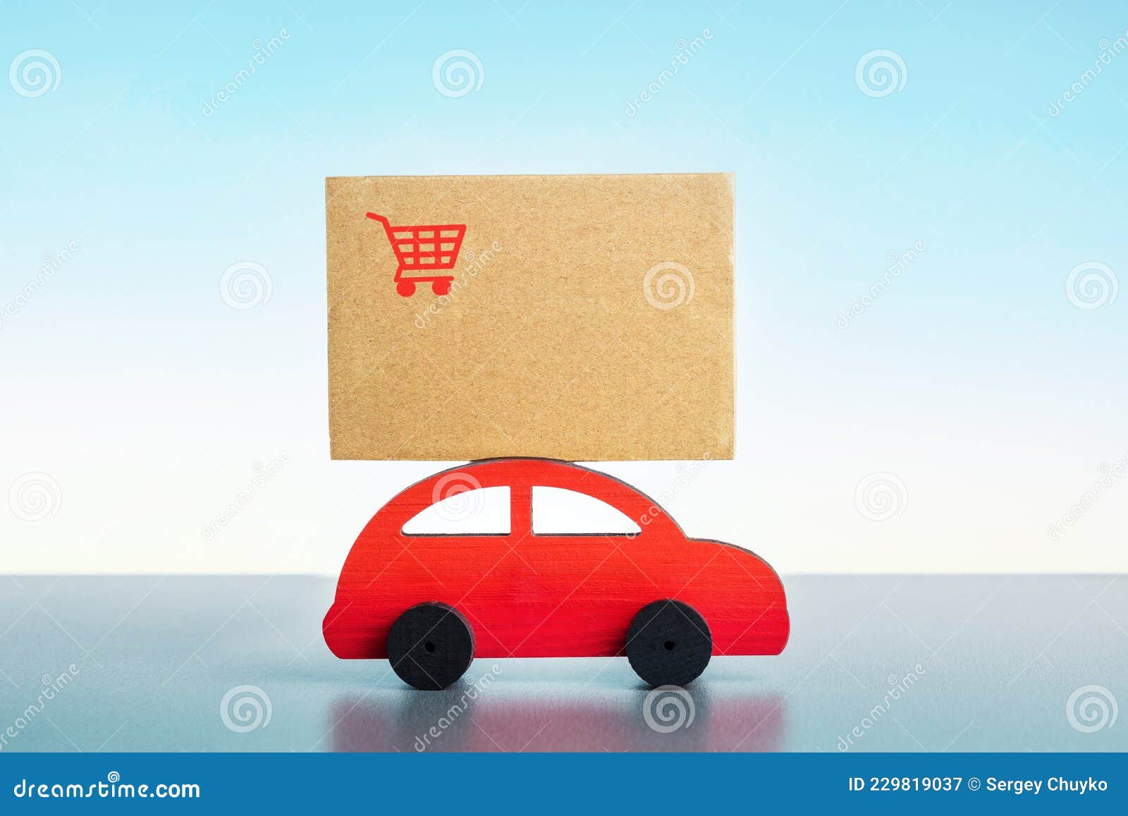 Toy Red Car with Box on Blue Background. Stock Image - Image of ...