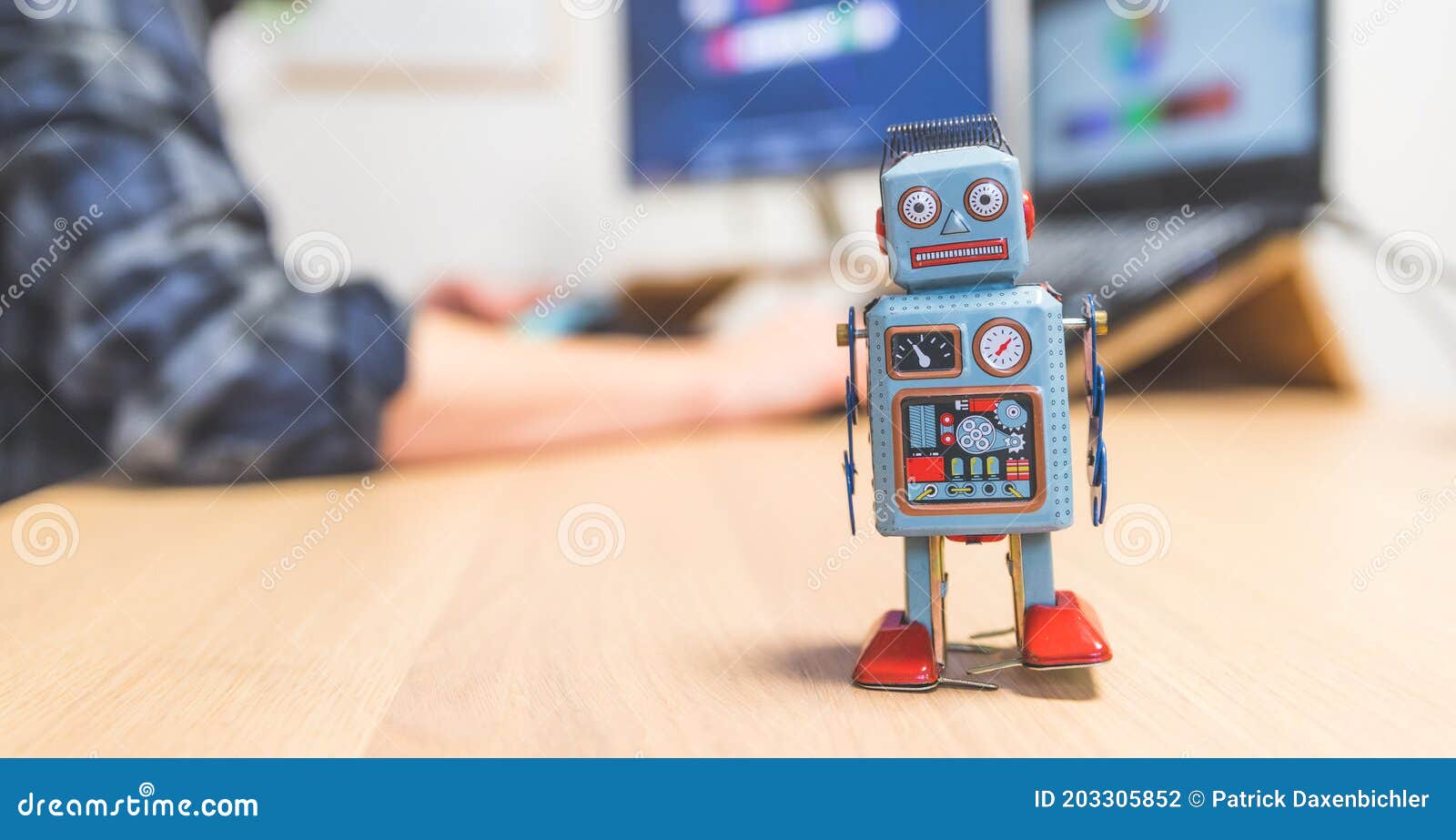 Artificial Intelligence Concept: Toy Robot on Office Desktop. Metaphor ...