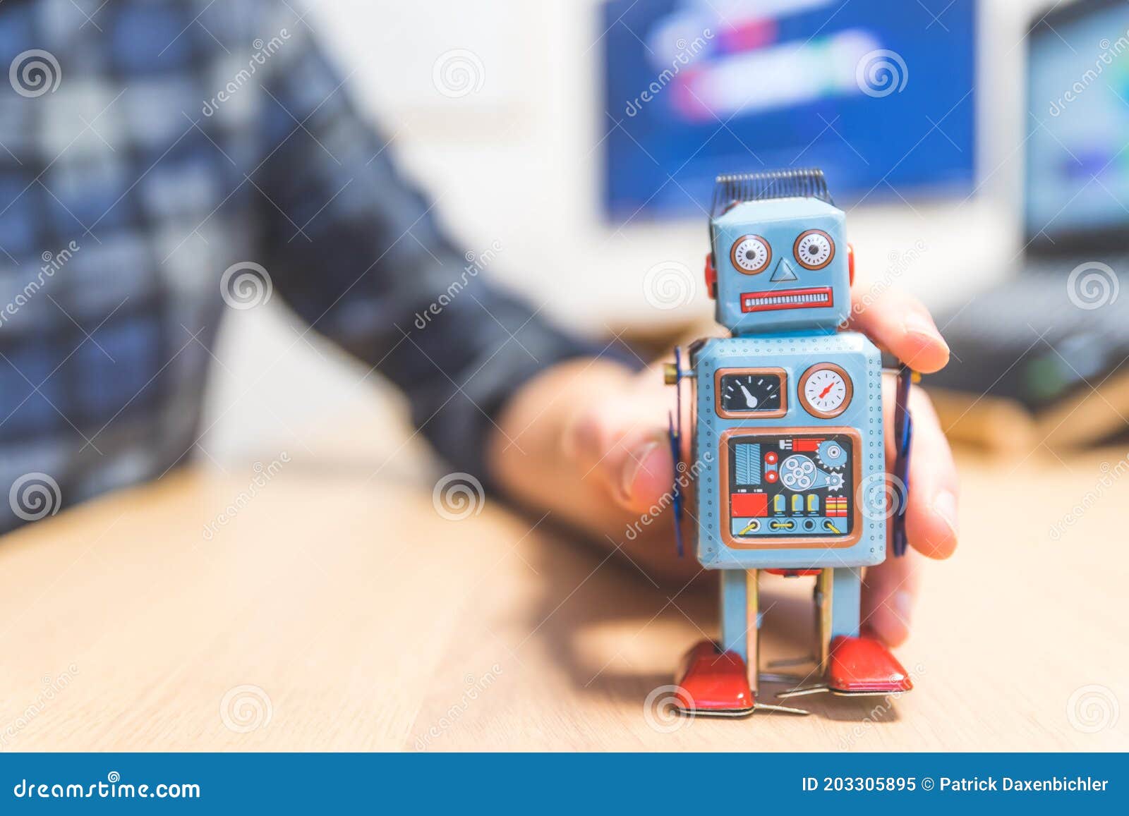 Artificial Intelligence Concept: Toy Robot on Office Desktop. Metaphor ...