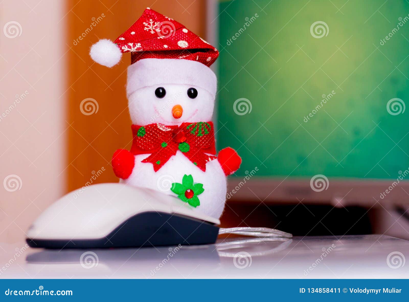 Toy Snowman at the Computer. Close-up. Work in the Office in the Winter ...