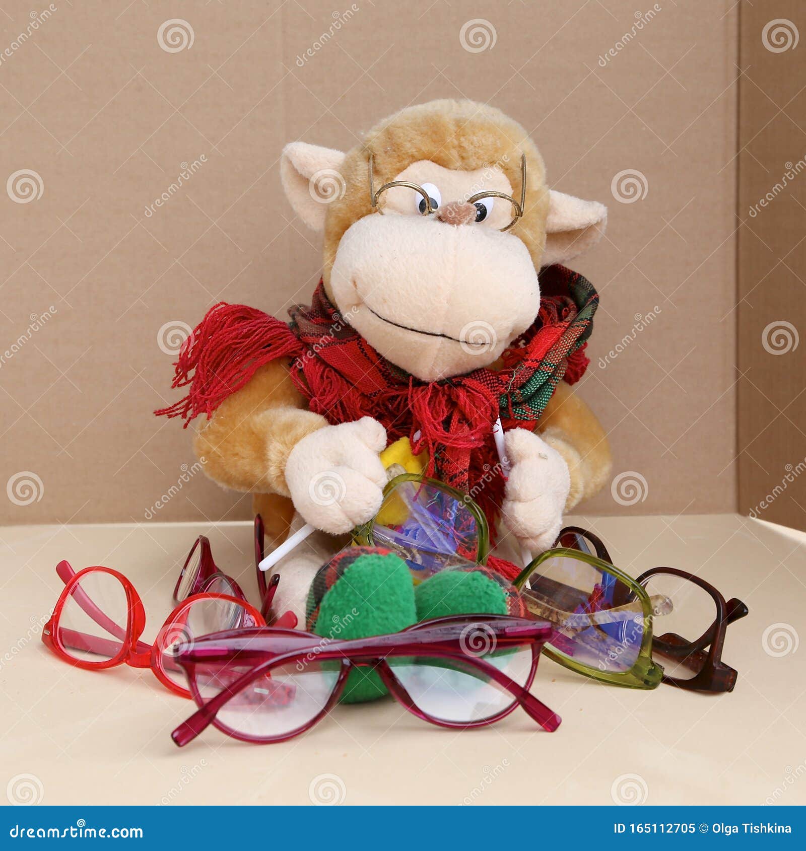 Toy Teddy Monkey in Glasses Will Tie with Pins and in Front of it ...