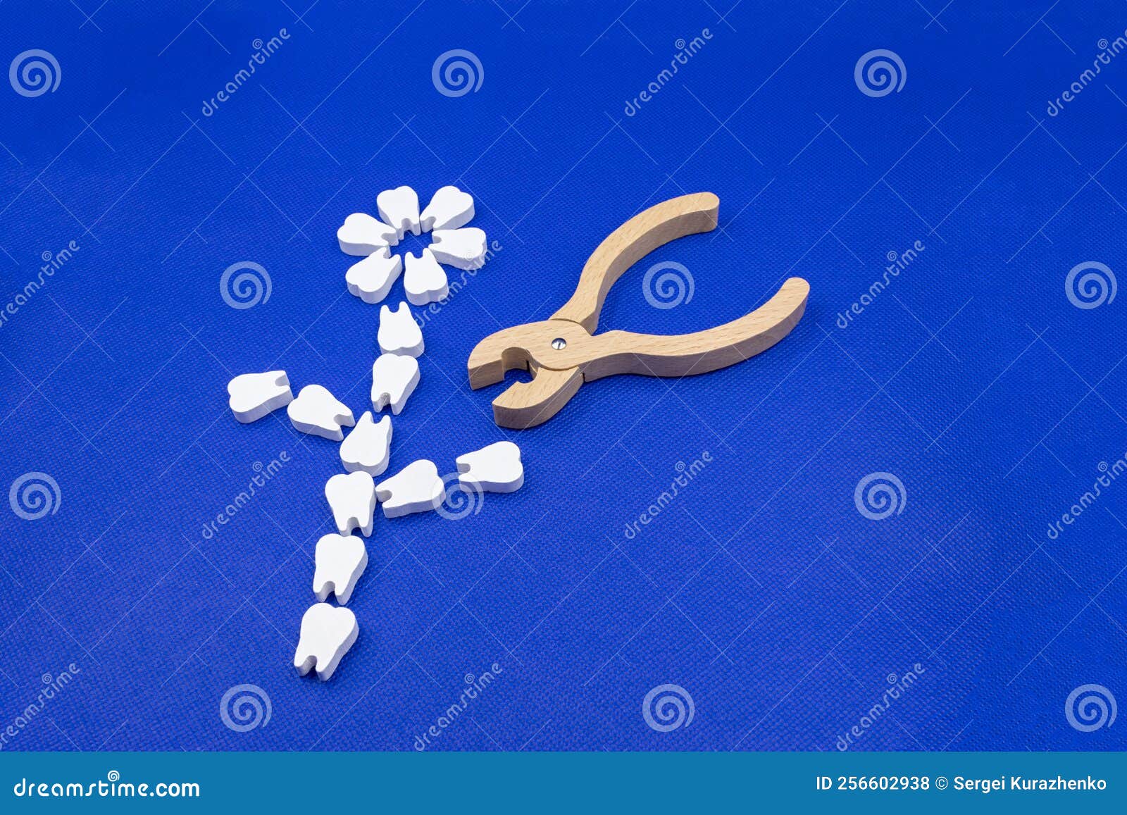 Toy Teeth on a Blue Background. Stomatologist Toy Set Stock Photo ...