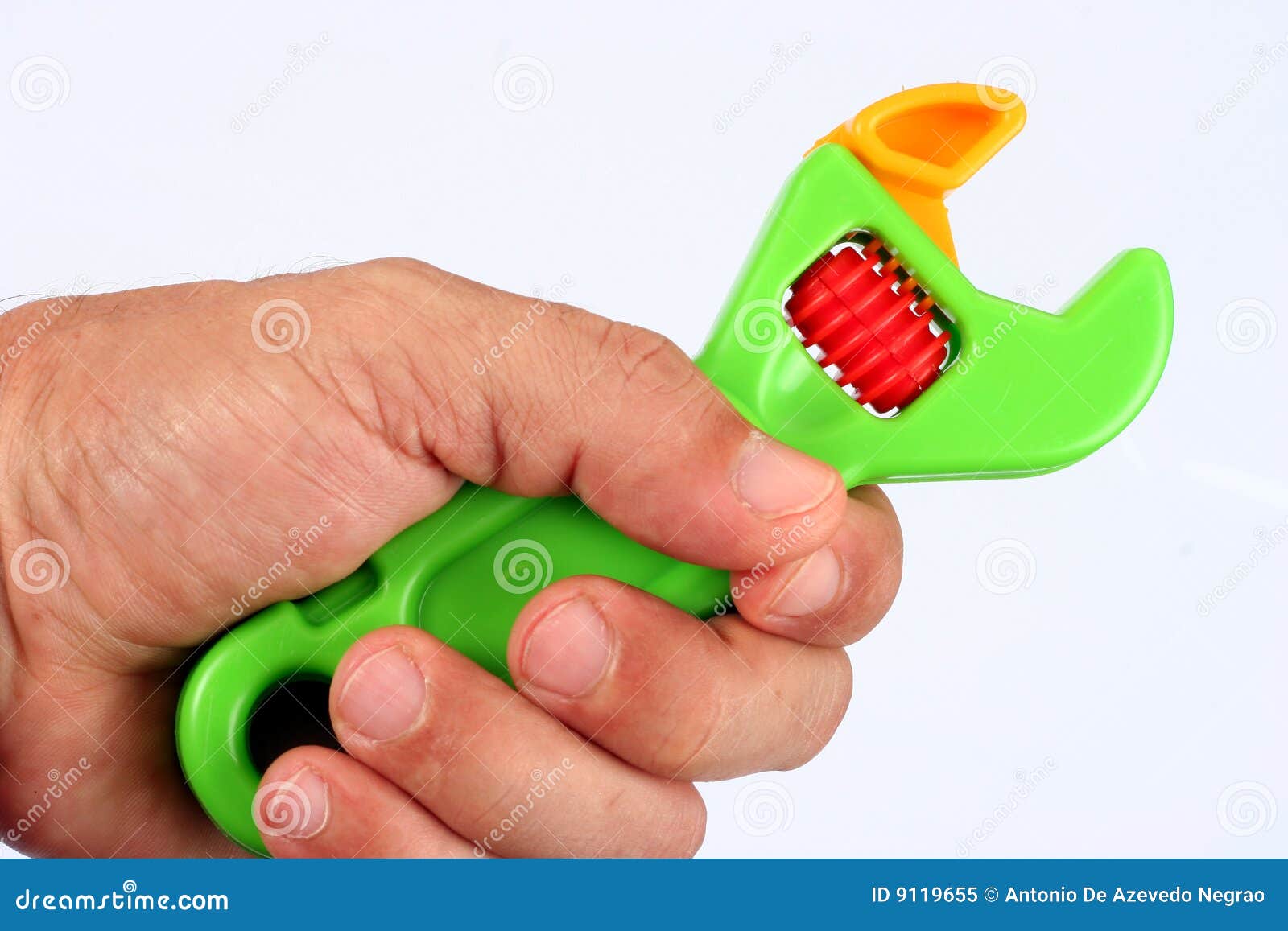 Toy tool in hand stock image. Image of isolated, green - 9119655