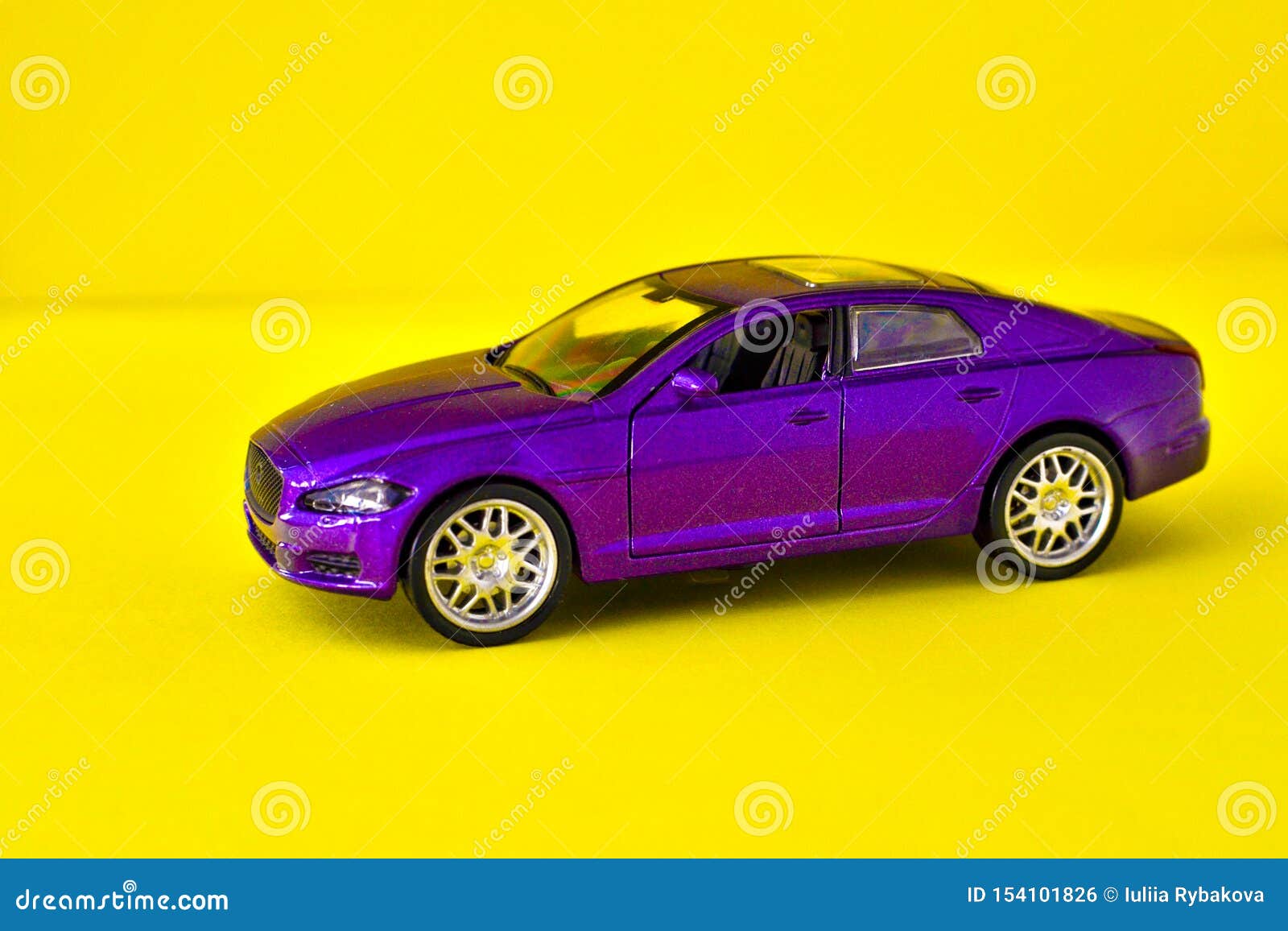 Toy Violet Model of Car on Yellow Background Stock Photo - Image of ...