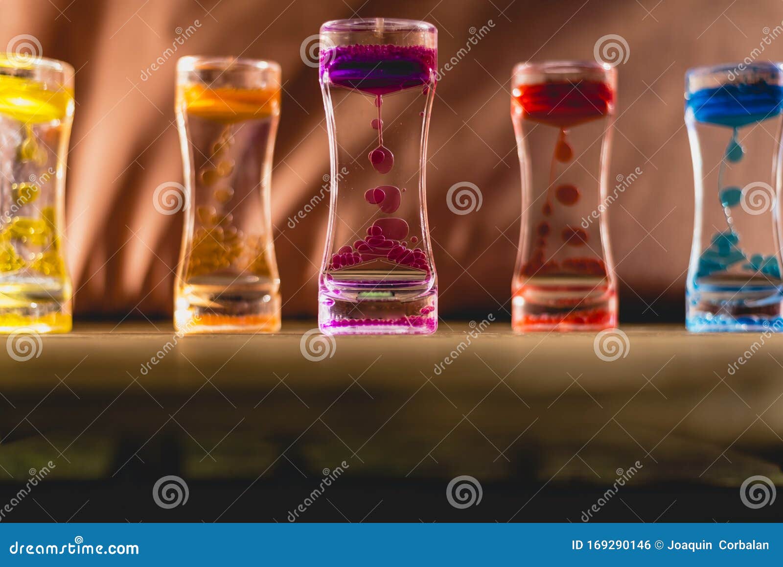 Toy with Water and Drops of Oil Colors Stock Photo - Image of flow ...