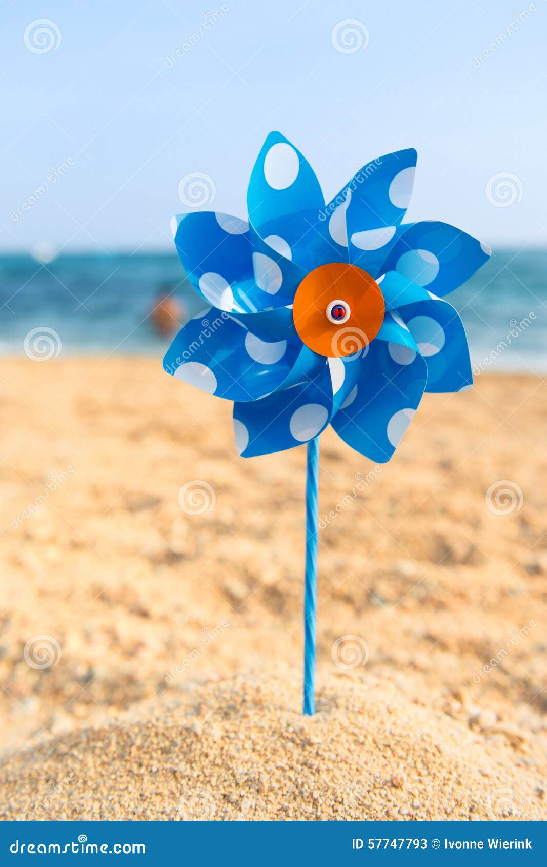Toy windmill at beach stock image. Image of childish - 57747793