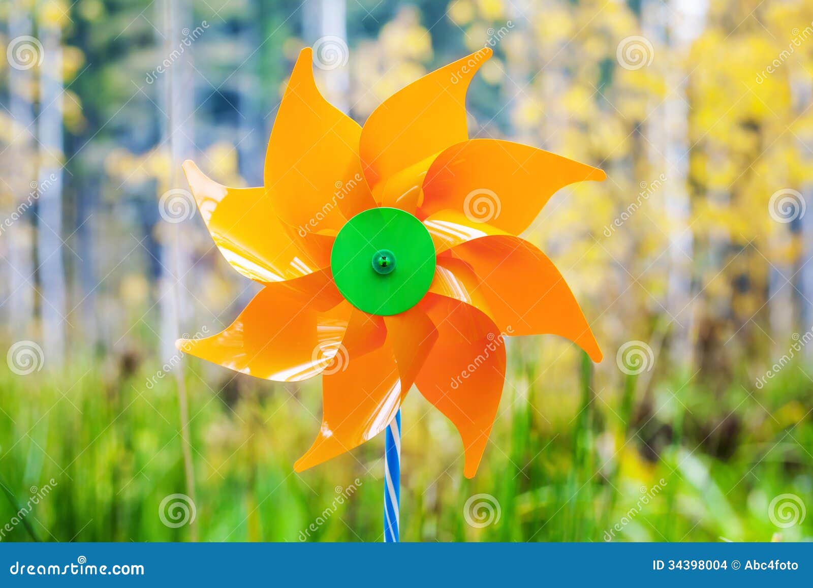 Toy windmill in the forest stock photo. Image of pinwheel - 34398004