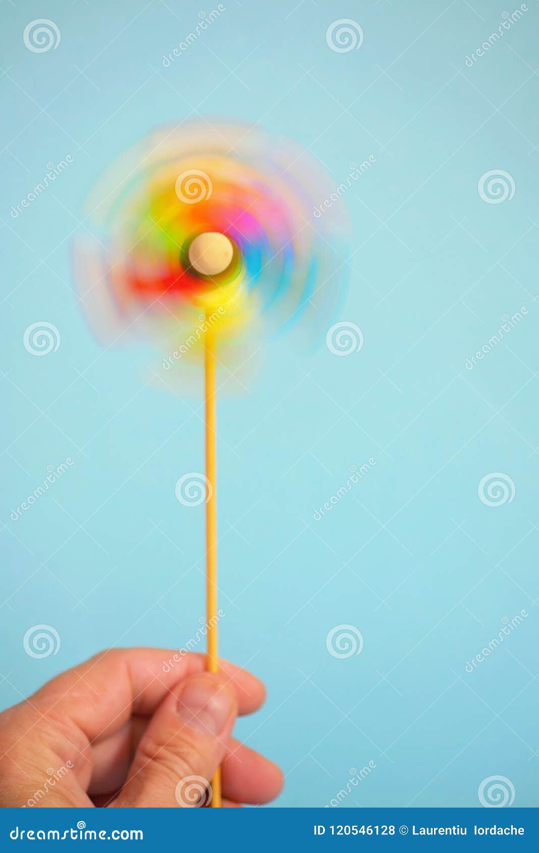 Toy windmill and hand stock photo. Image of kids, pinwheel - 120546128
