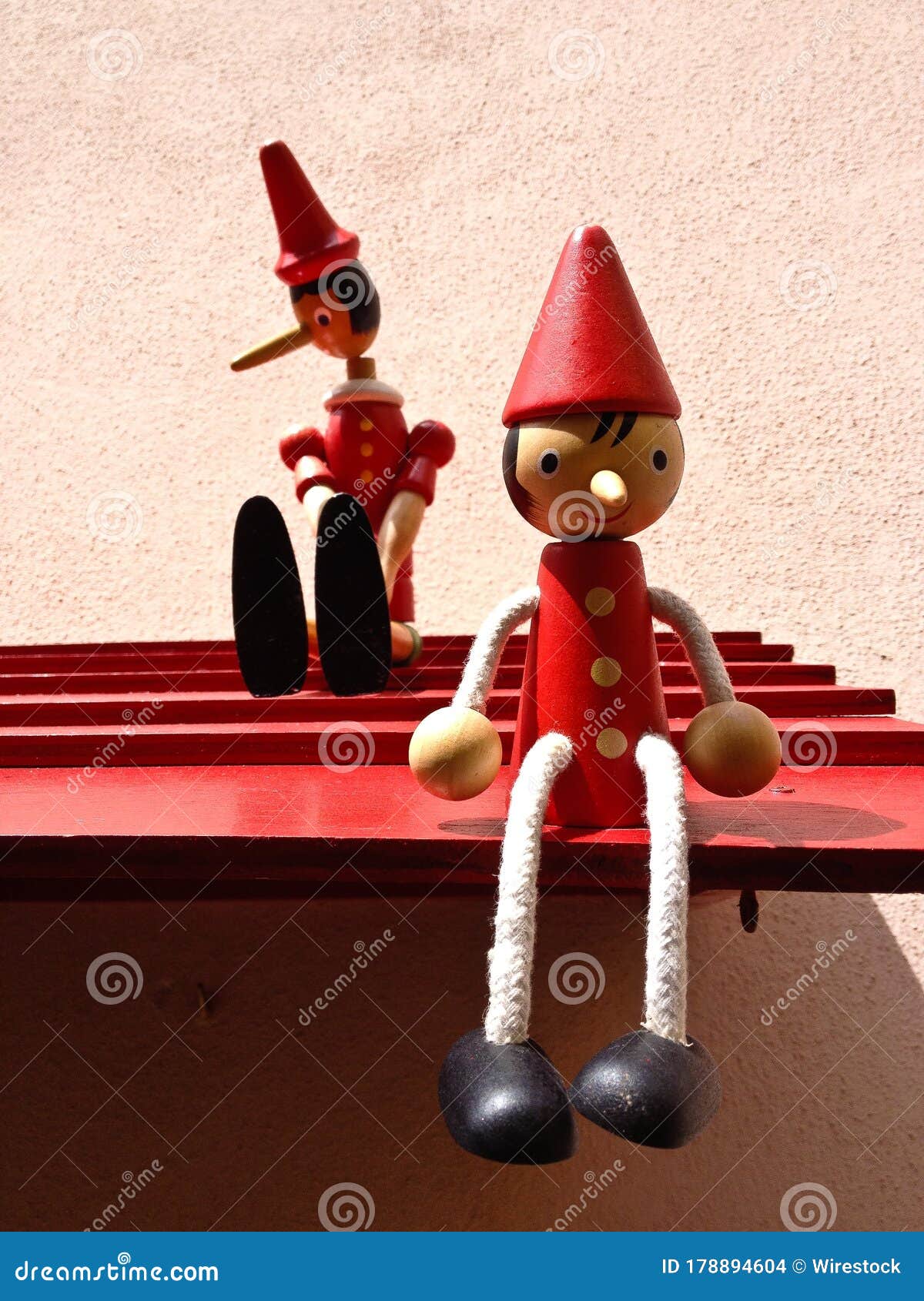 Toys of Pinocchio Sitting on a Surface Attached To the Wall Stock Photo ...