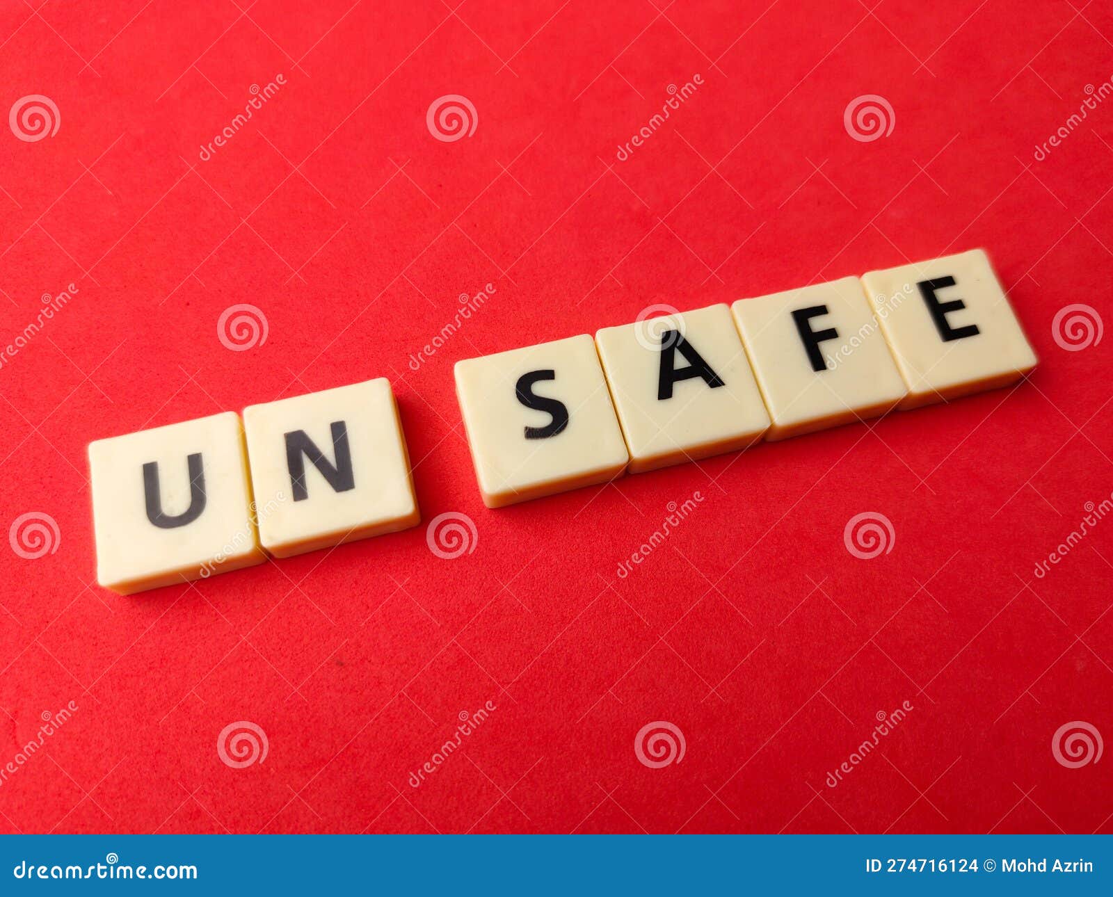 Toys Word with Word UN SAFE Stock Photo - Image of construction ...