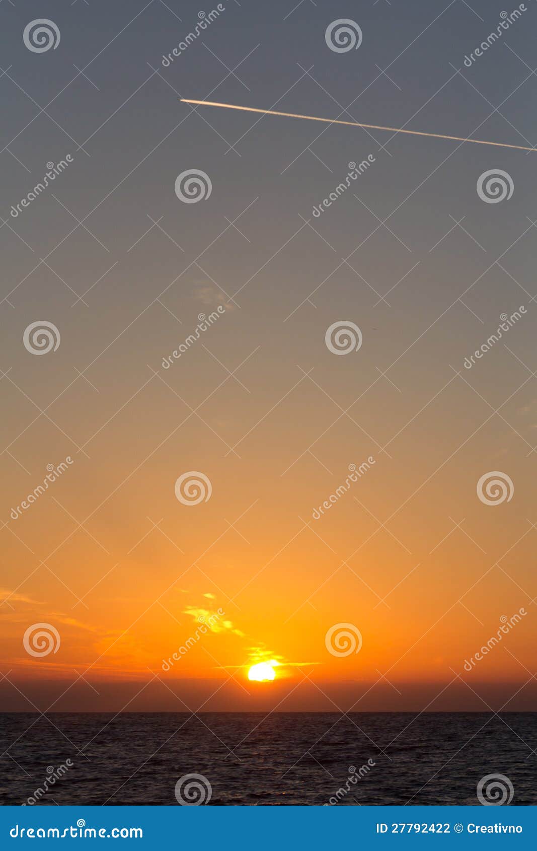 Trace of plane at sunset. stock photo. Image of cloudy - 27792422