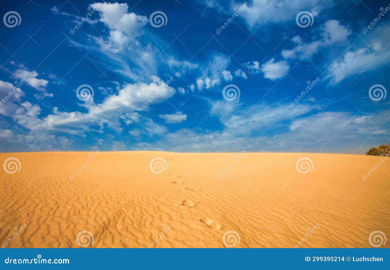 Traces of Human Steps on the Sand in the Desert Under the Blue Sky ...