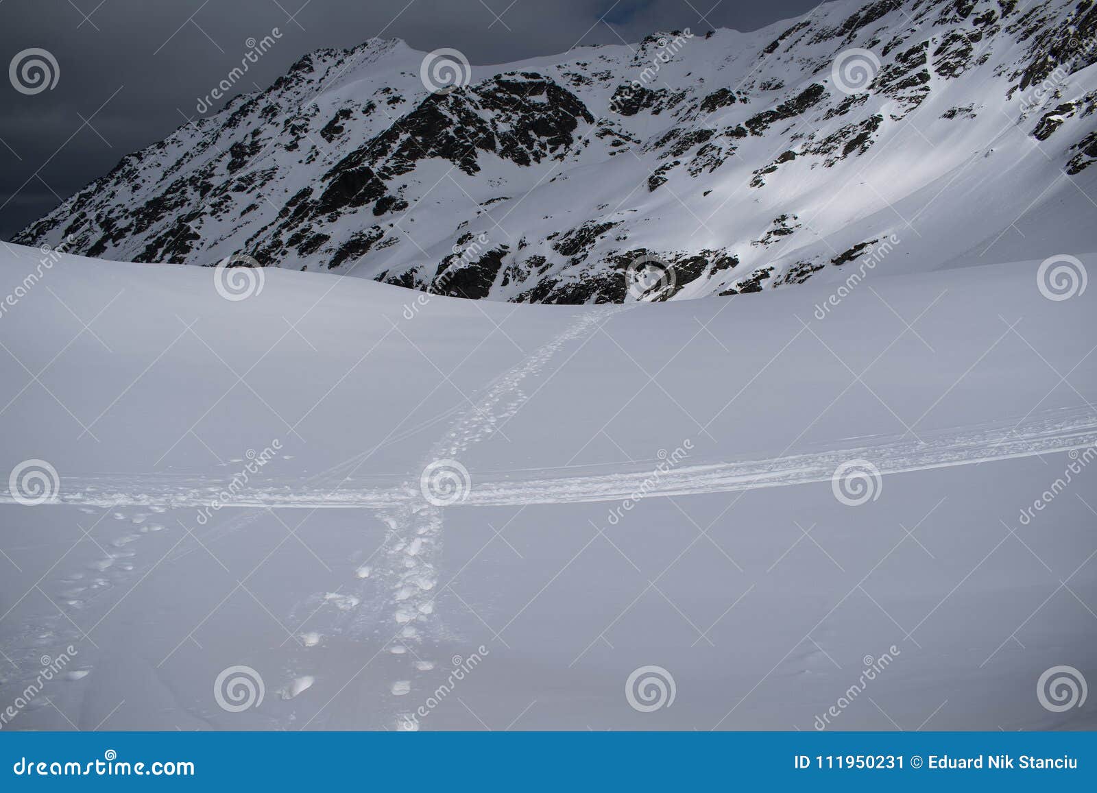 Traces in snow stock image. Image of mountain, footprint - 111950231