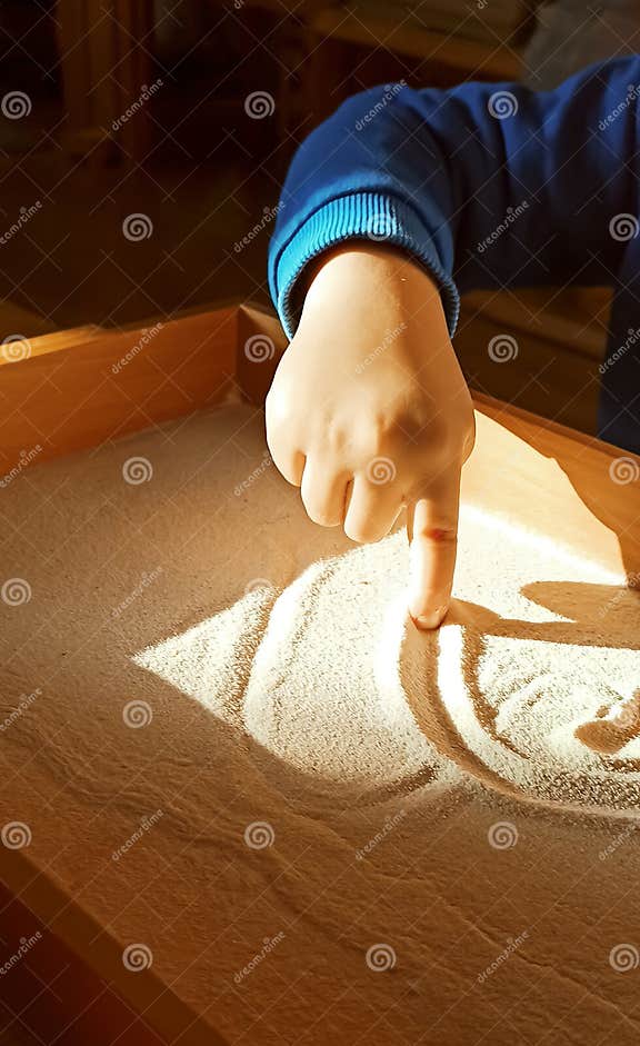 Tracing Letters on the Sand Stock Photo - Image of preschool, sand ...