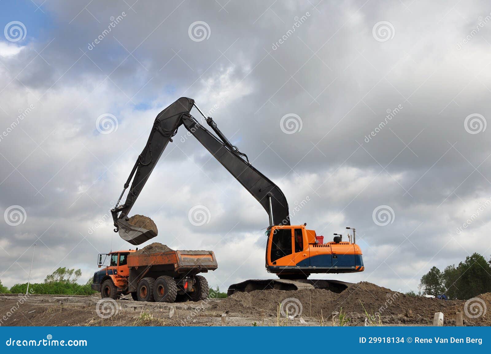 Loading a dumper truck stock photo. Image of building - 29918134