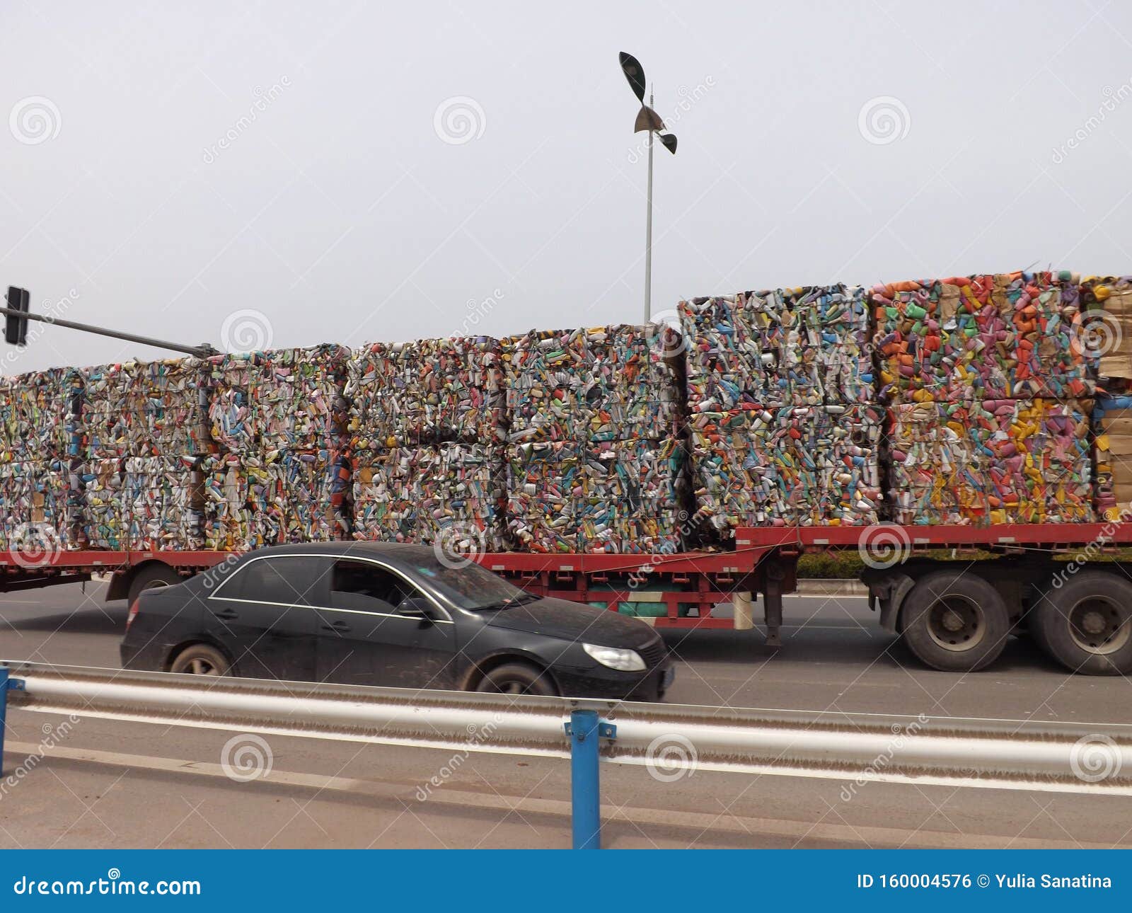 The Track with Pressed Cubes of Garbage on the Highway Stock Photo ...