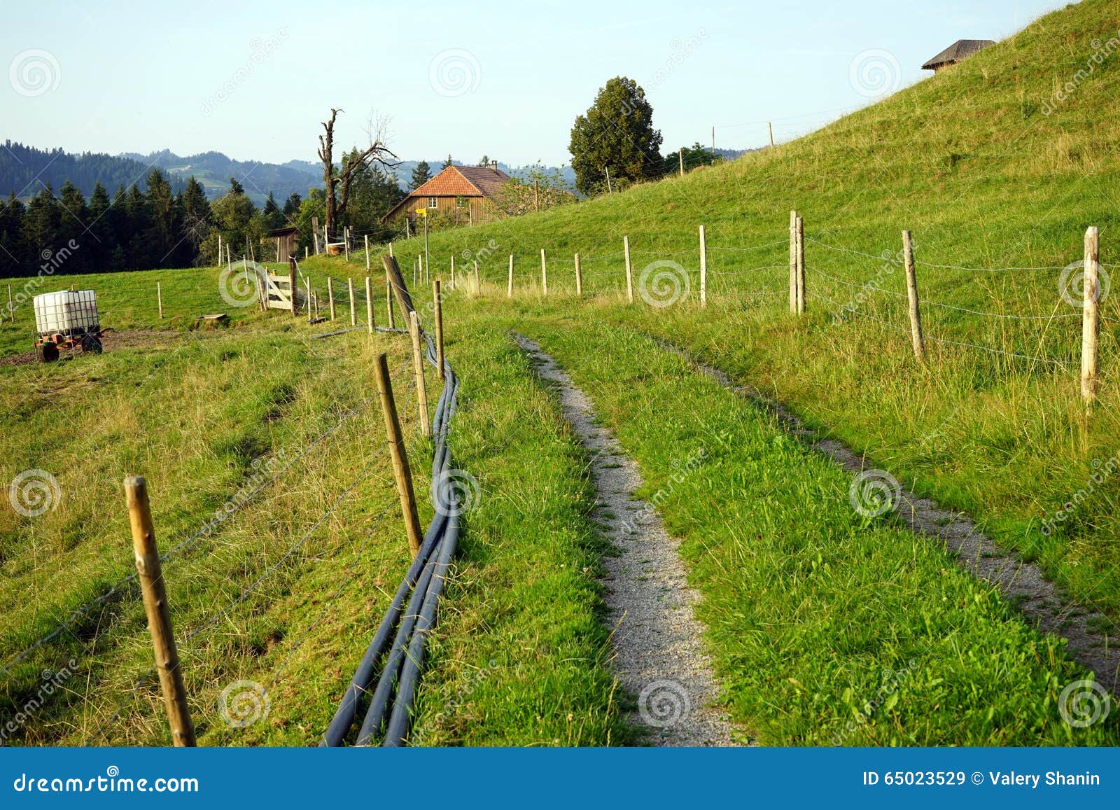 Track and slope stock image. Image of dirt, fence, landscape - 65023529