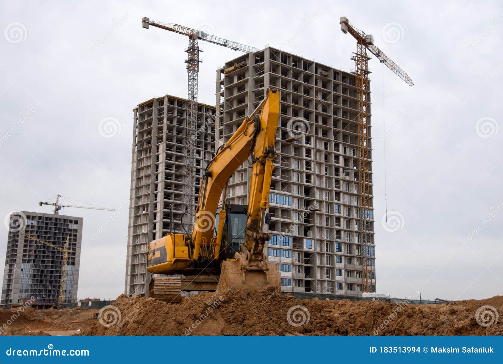 Track-type Excavator during Earthmoving at Construction Site. Backhoe ...