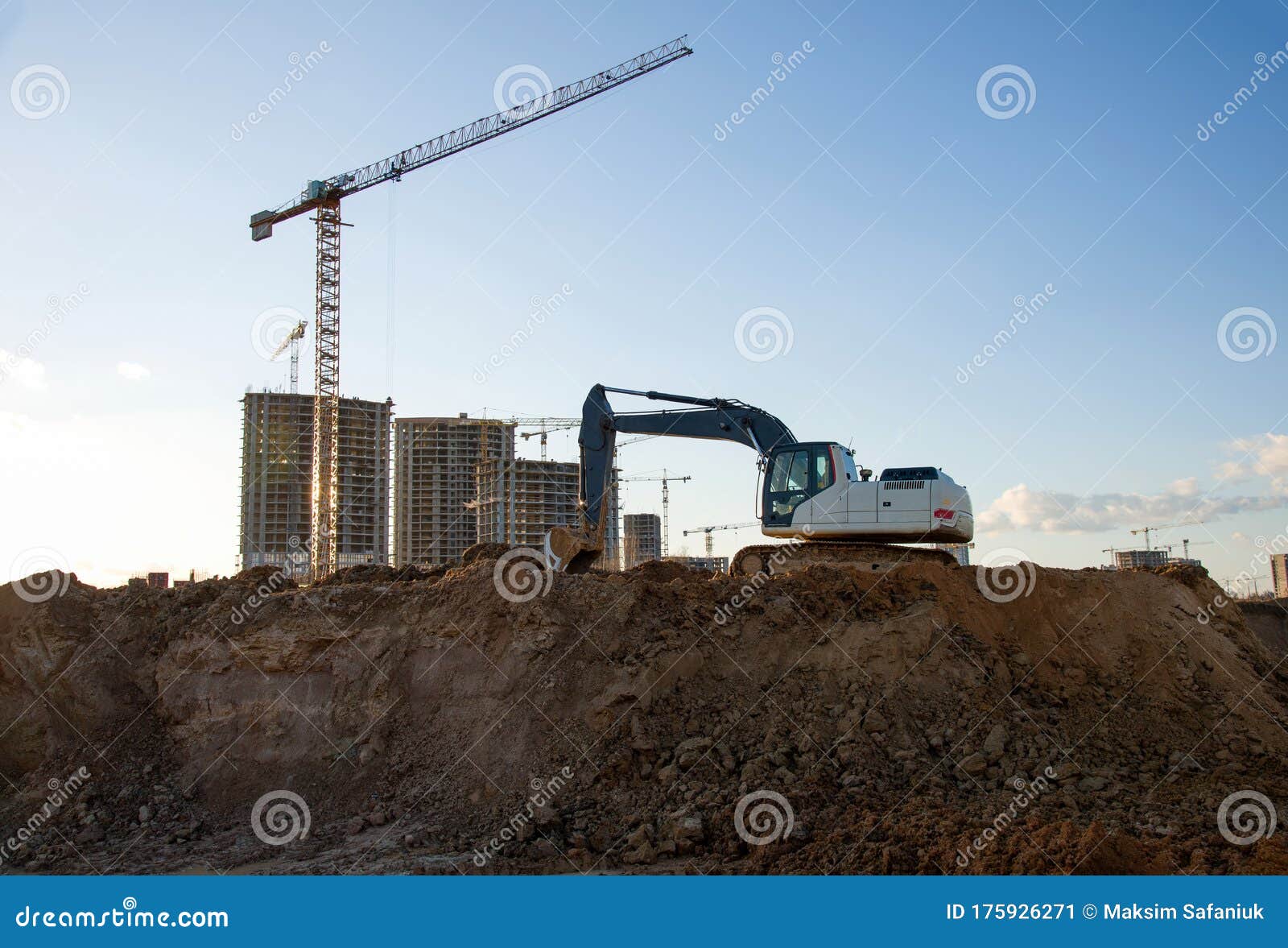 Track-type Excavator during Earthmoving at Construction Site. Backhoe ...