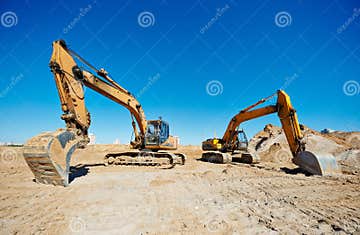 Track-type Loader Excavators at Work Stock Photo - Image of earth ...