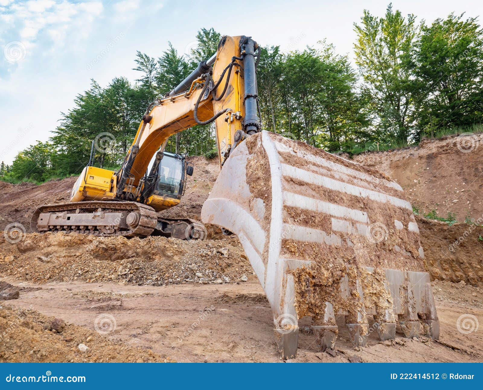 Track Type Loader is Mining Stones in Opencast Mining Quarry Stock ...