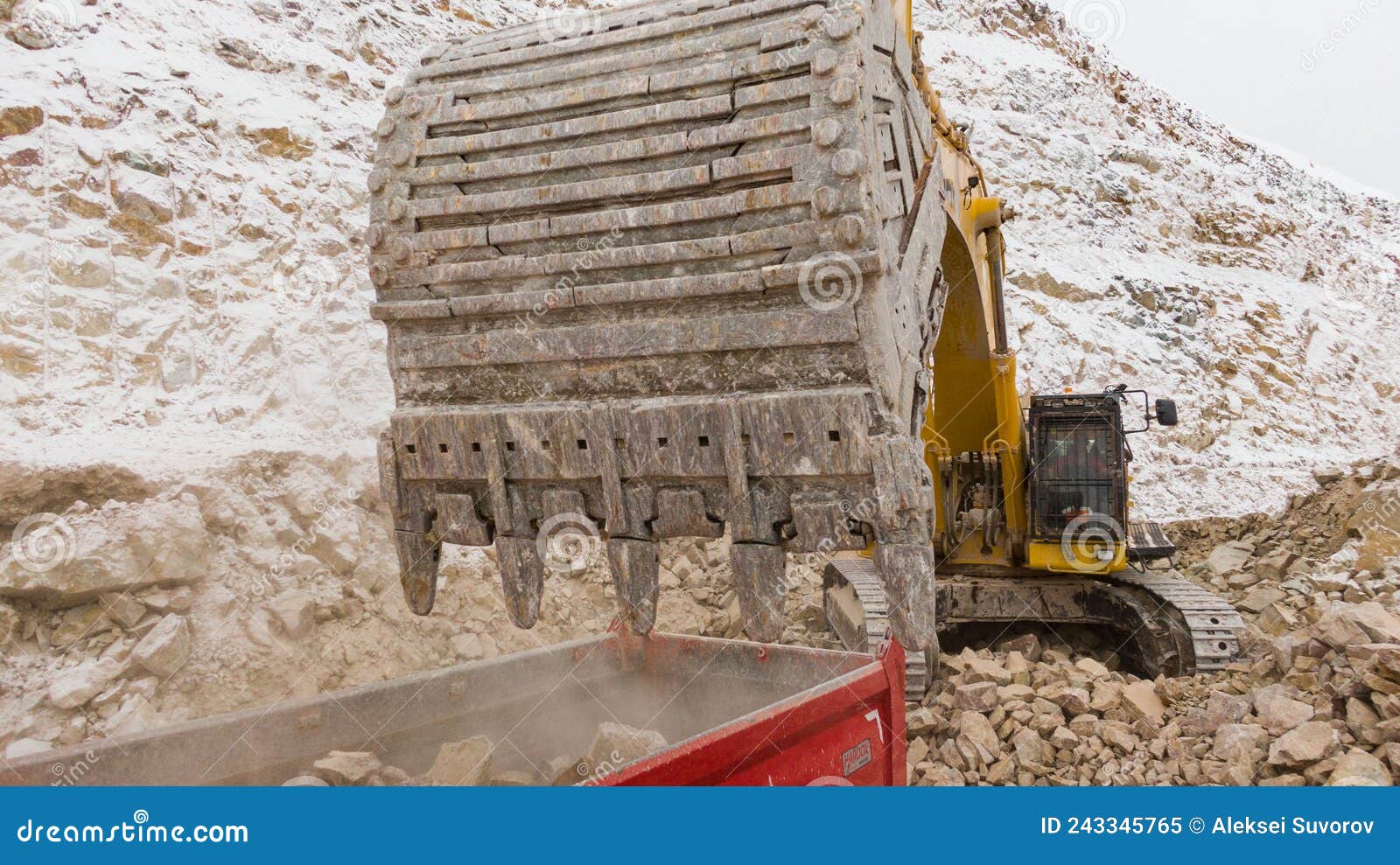 Tracked Excavator Loading the Material in a Truck Stock Image - Image ...