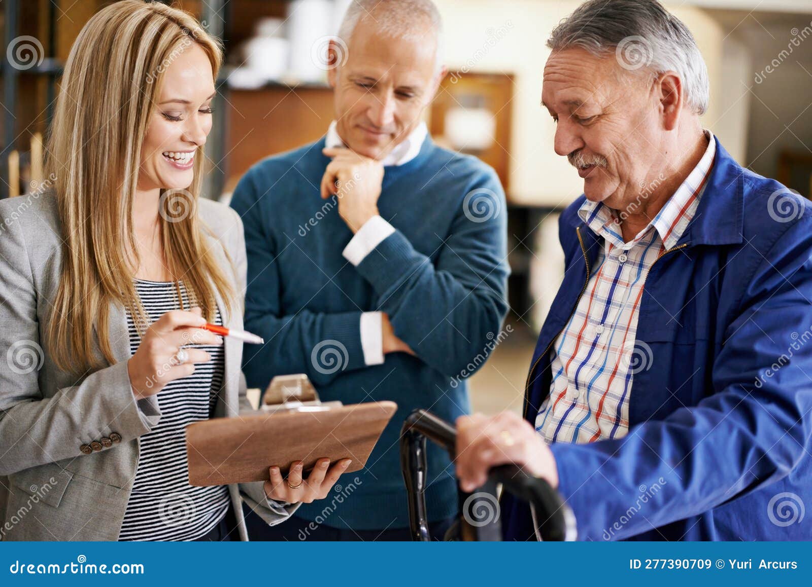 Tracking Orders. People at Work in a Distribution Warehouse. Stock ...
