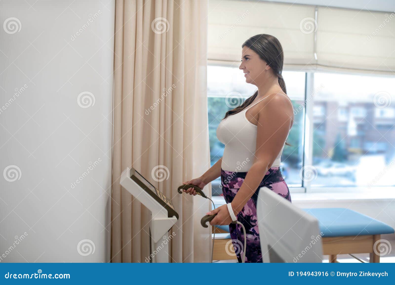 Woman Tracking Her Body Parameters Using Modern Equipment Stock Photo ...