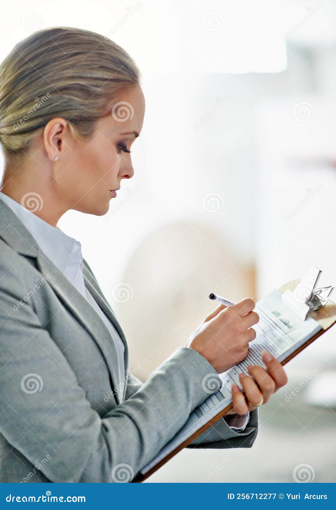 Tracking and Tracing. a Woman Holding a Clipboard in a Warehouse. Stock ...