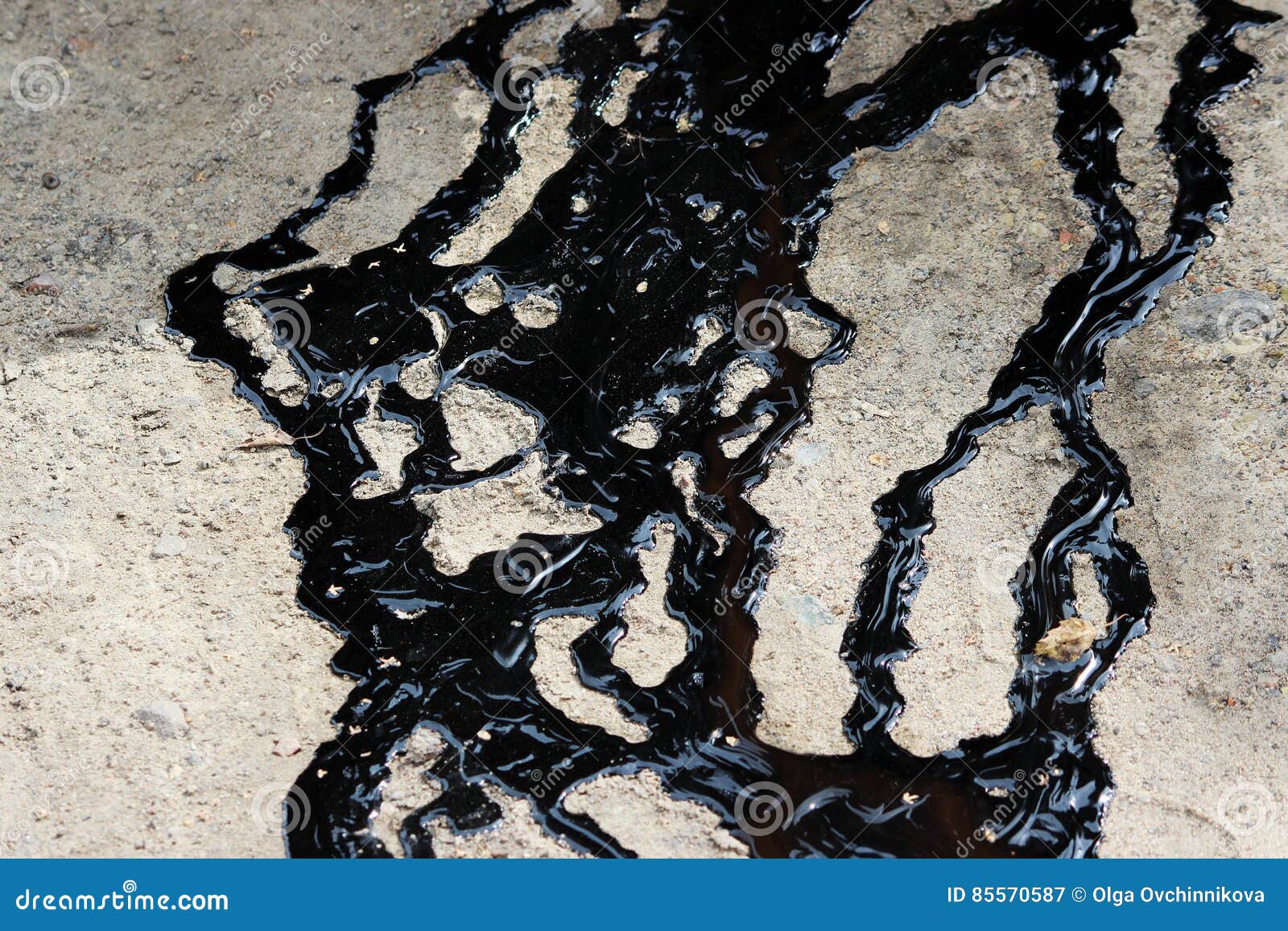 Tracks of Black Tar are Poured on the Sand. Stock Image - Image of ...