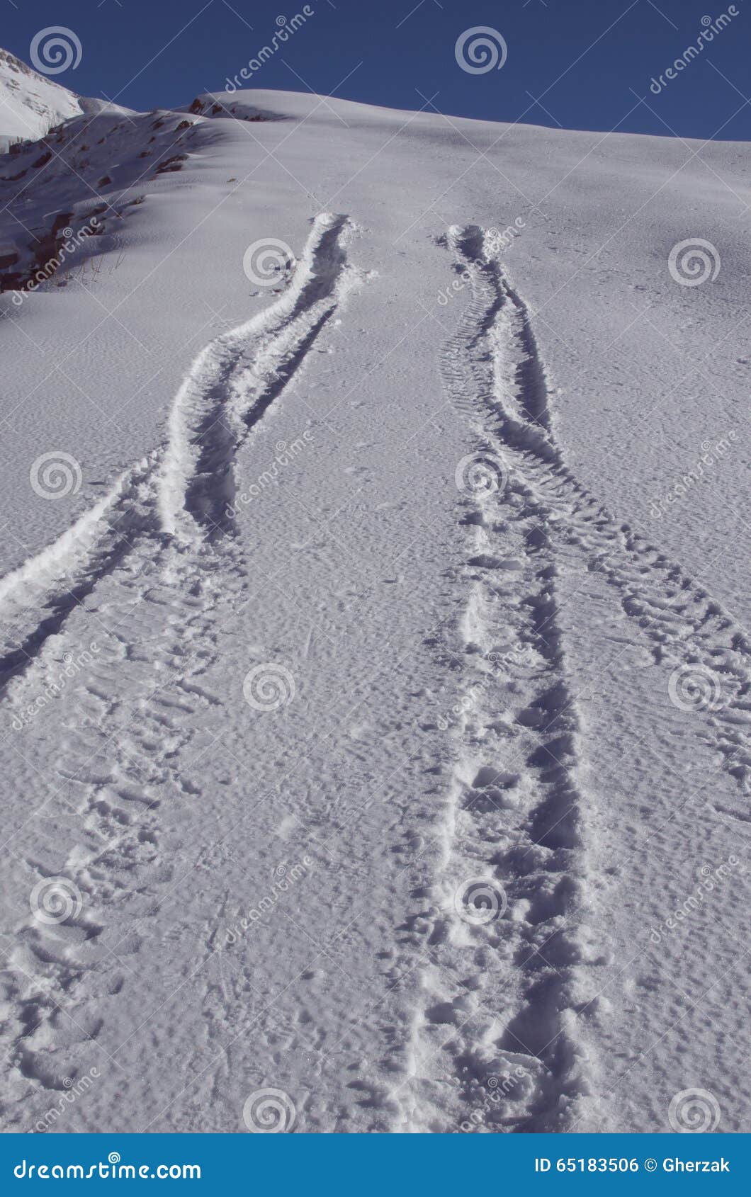 Tracks Of Car Stop And Reverse In The Snow Of An Alpine Slope. Royalty ...