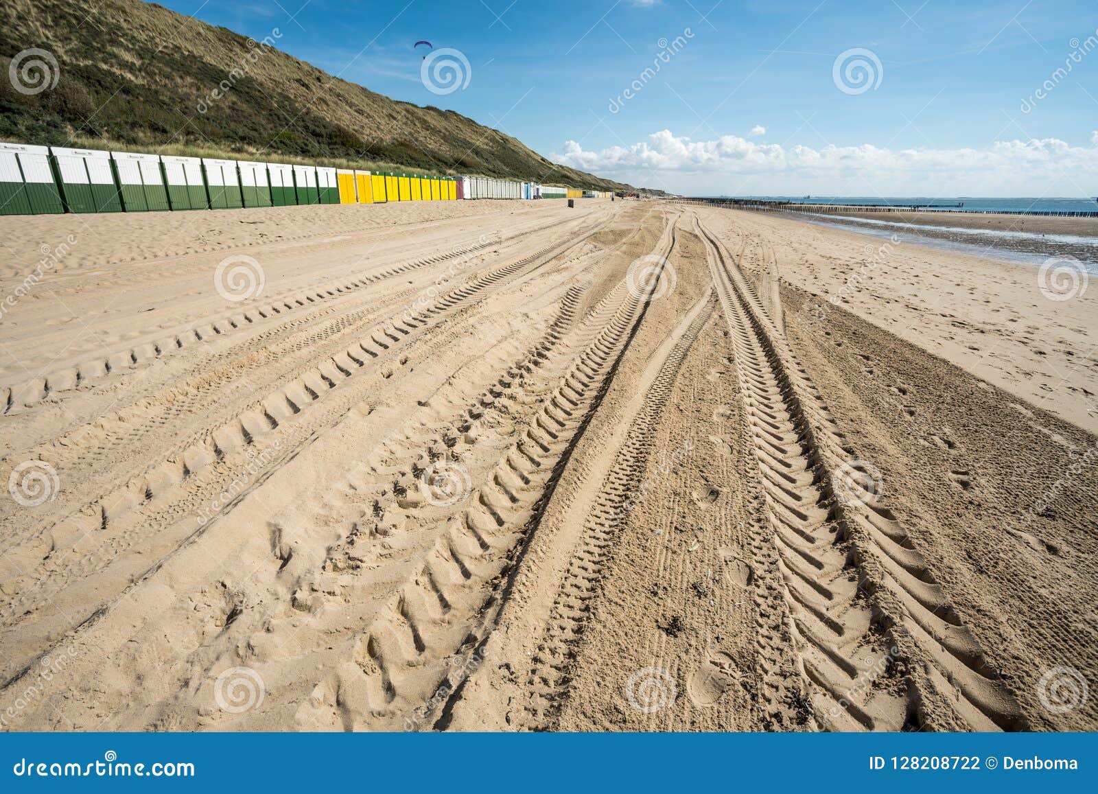 Tracks in the sand stock photo. Image of trail, tire - 128208722