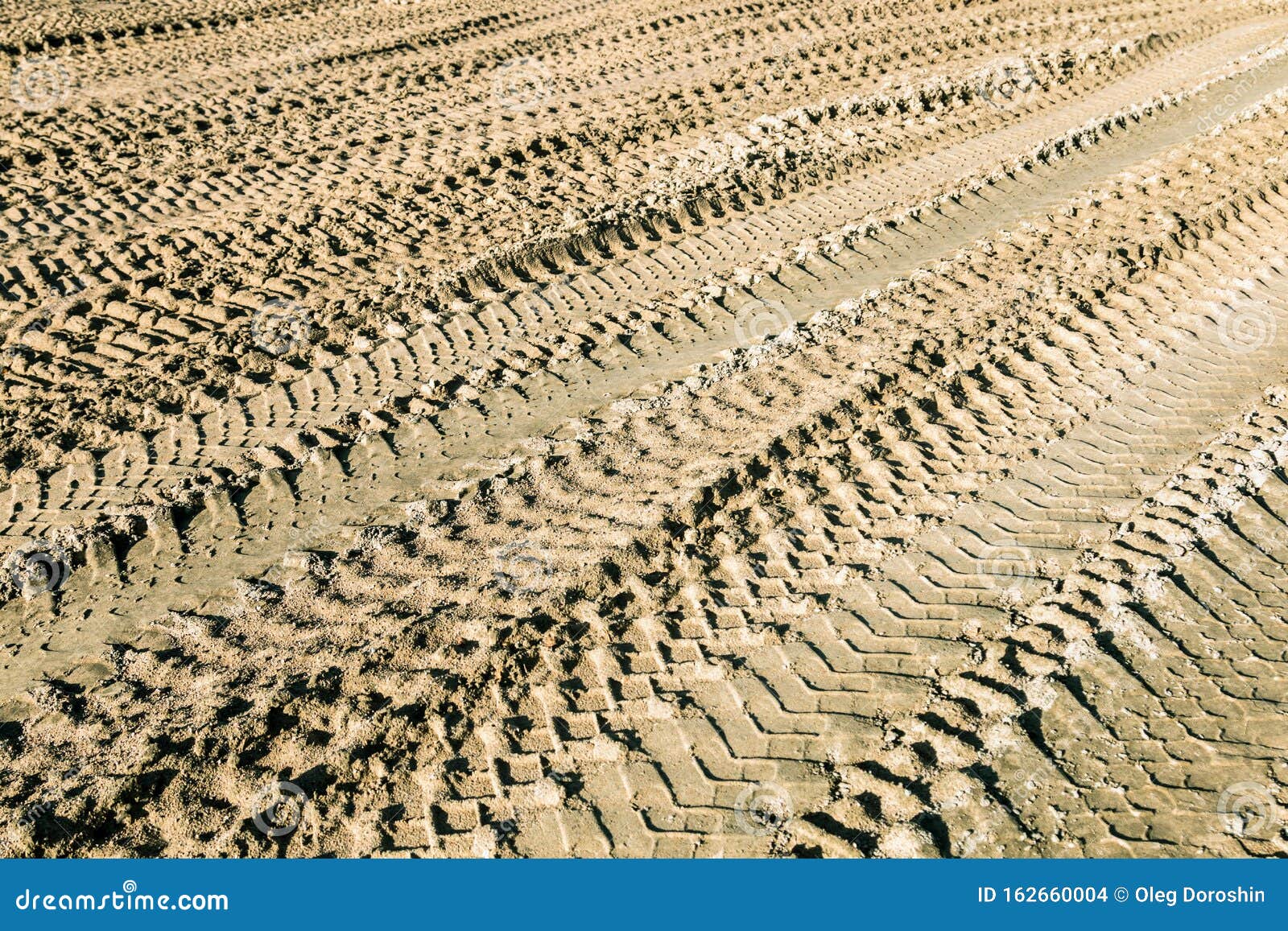 Tracks on the Sand from the Wheels and Tracks of a Tank, Tractor ...