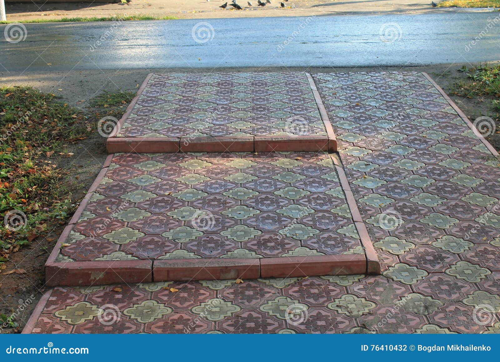 Tracks from tiles stock photo. Image of tile, city, pattern - 76410432