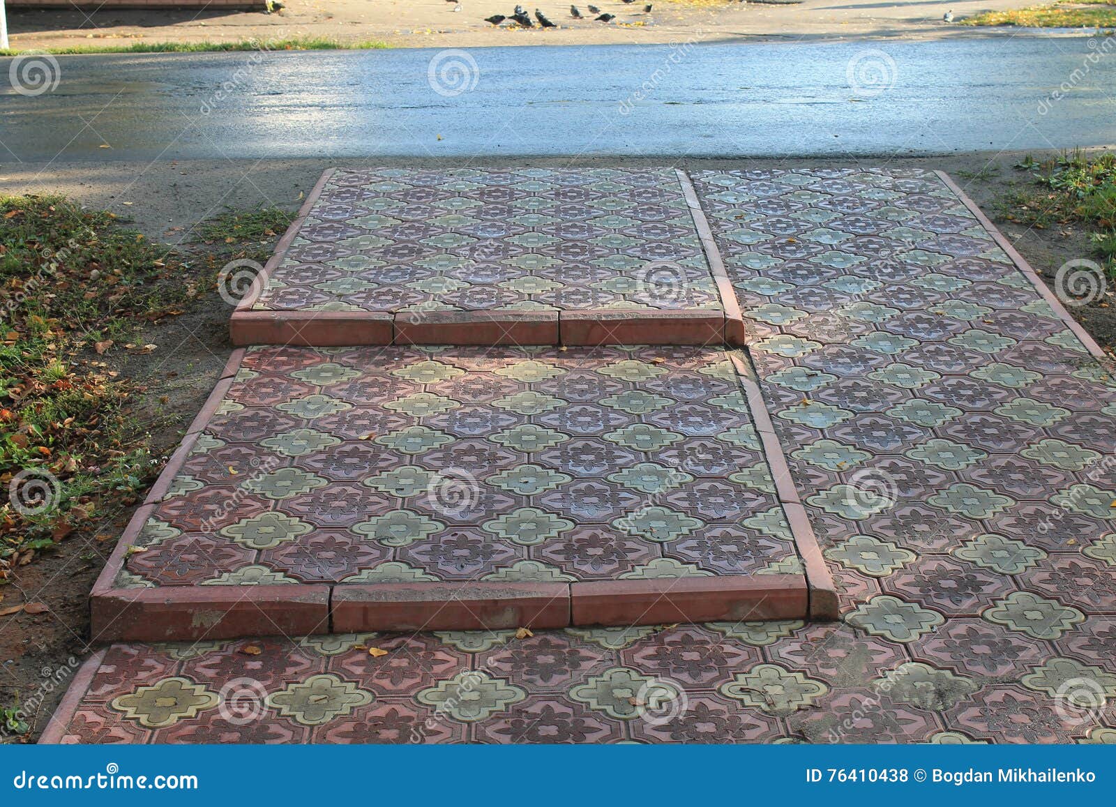 Tracks from tiles stock photo. Image of alleys, design - 76410438
