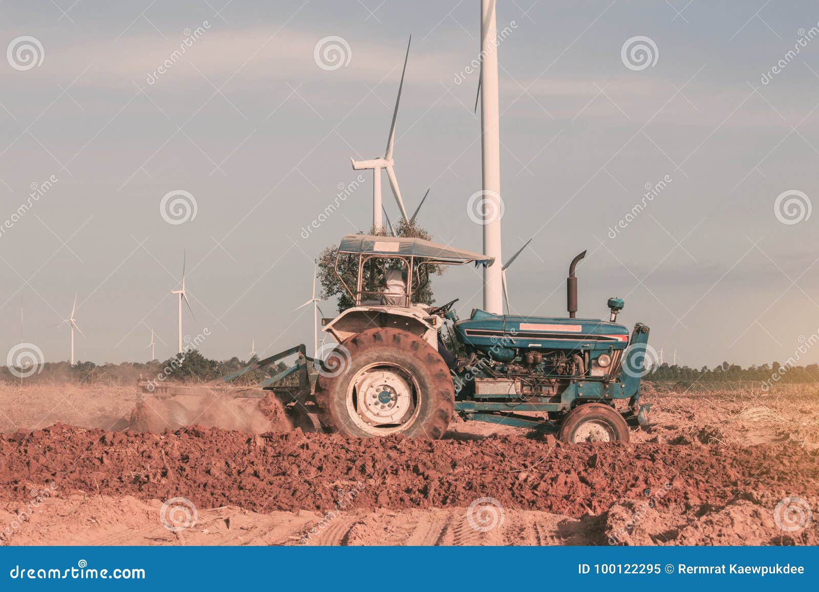 Tracktor on a fields. stock image. Image of farmer, rural - 100122295