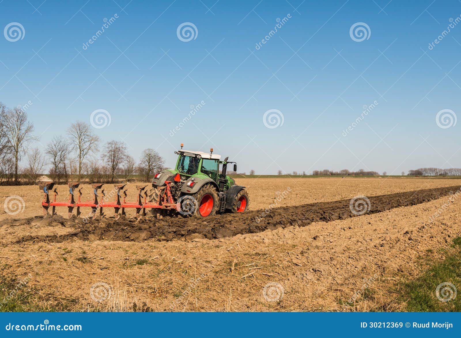 Plowing the farmland stock image. Image of outdoors, agricultural ...