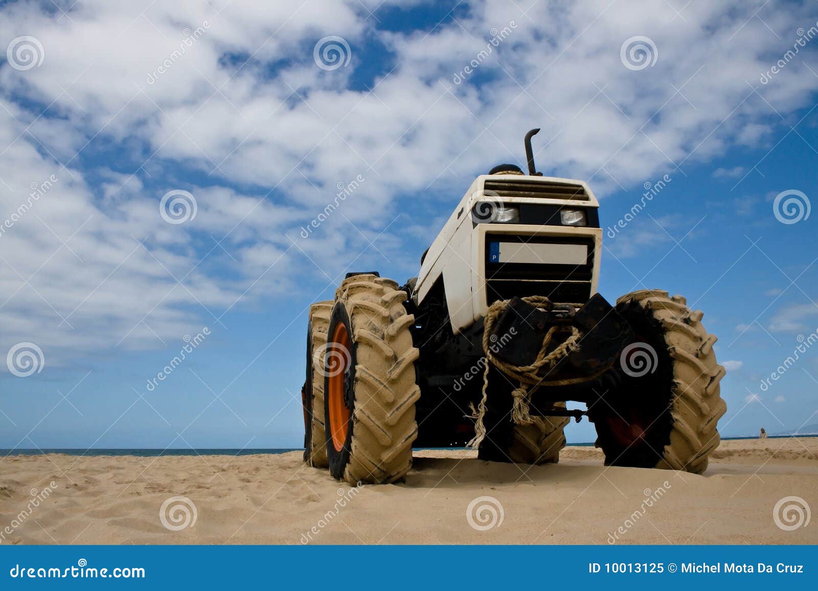 Tractor on the beach stock image. Image of blue, lonely - 10013125