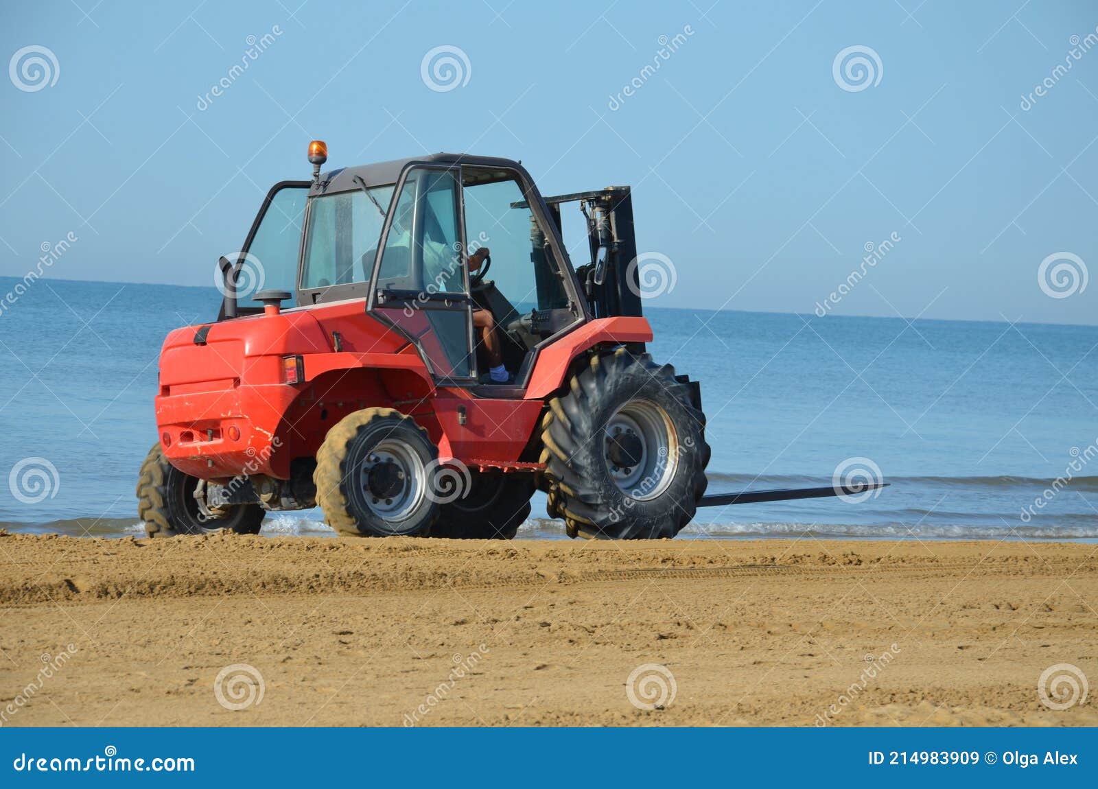 Tractor on the beach stock image. Image of transport - 214983909