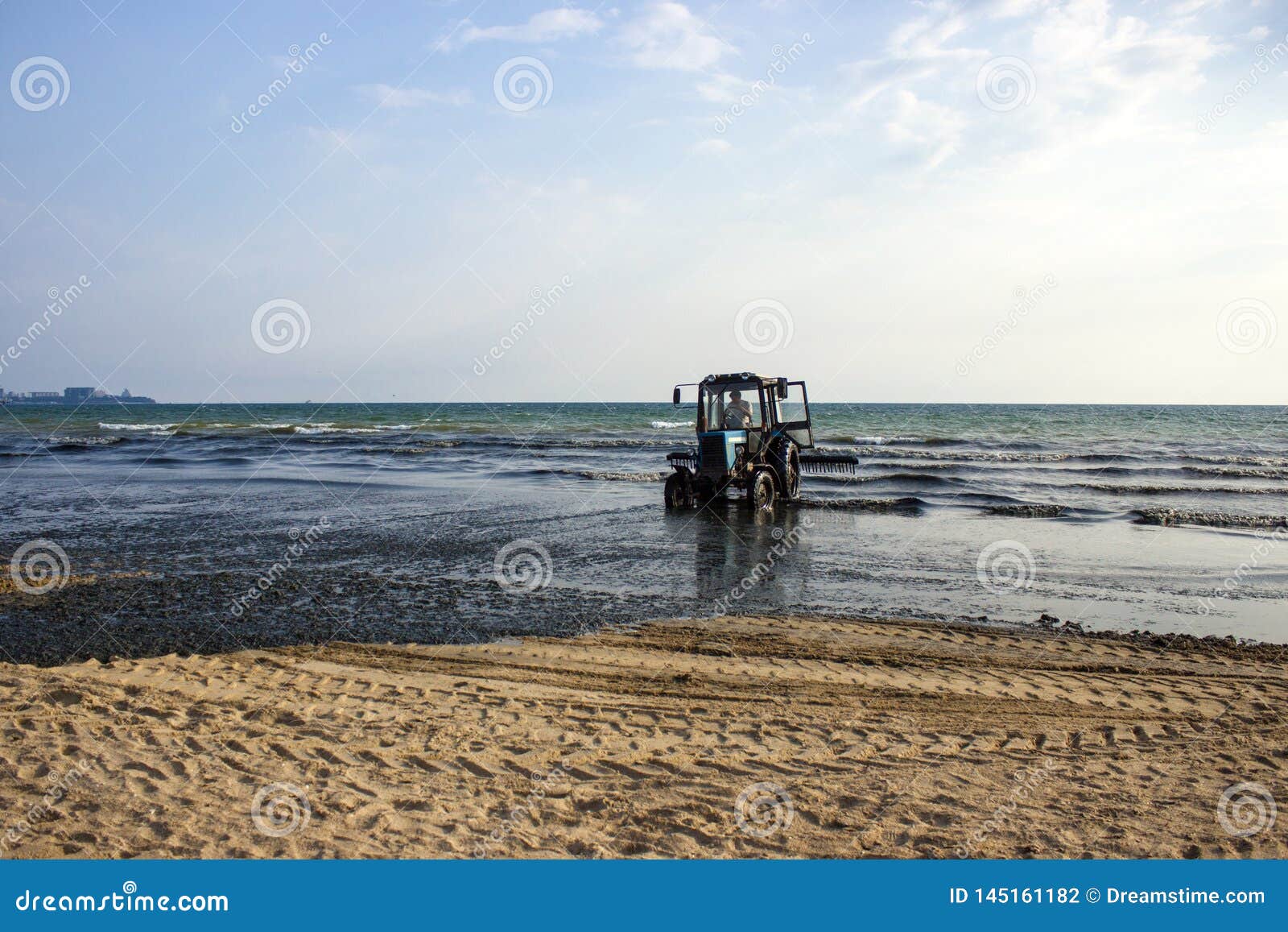 Tractor on the beach stock photo. Image of sand, outdoors - 145161182
